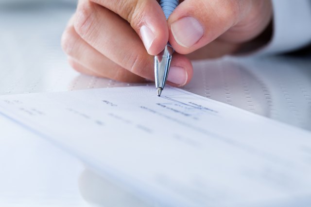 How to Sign a Bank Check When You Are the Power of Attorney | Sapling